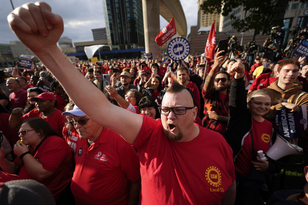 Workers strike at all 3 Detroit automakers, a new tactic to squeeze ...